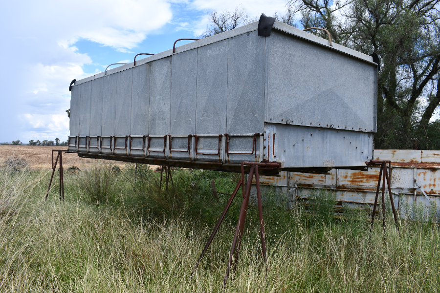 Lot 34 - Parkes Industries side delivery bin (galvanised) | AuctionsPlus