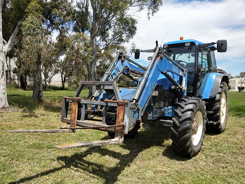 LOT 9 - New Holland TM115 FWA Tractor | AuctionsPlus