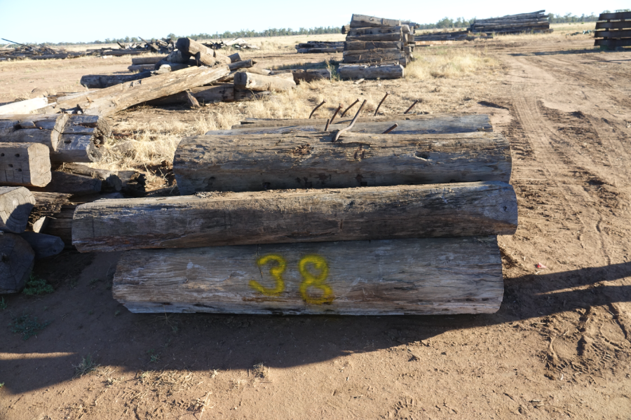 Lot 38 - 11 X TIMBER PILES IRON BARK POST | AuctionsPlus
