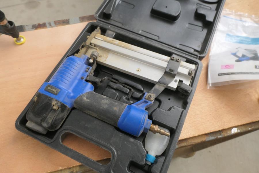Lot 129 - Taurus Air Nail Gun kit | AuctionsPlus