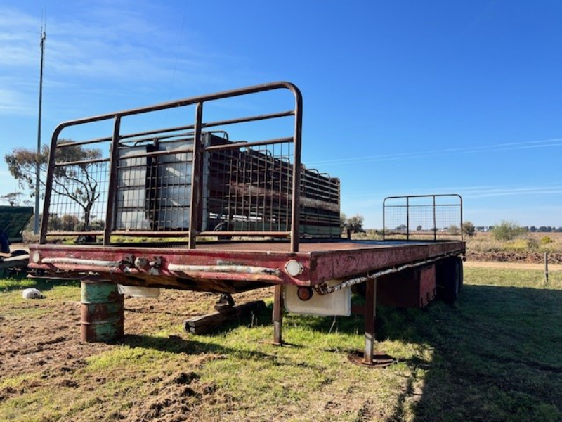 Lot 10 - Tandem Axle Flat Top Trailer | AuctionsPlus