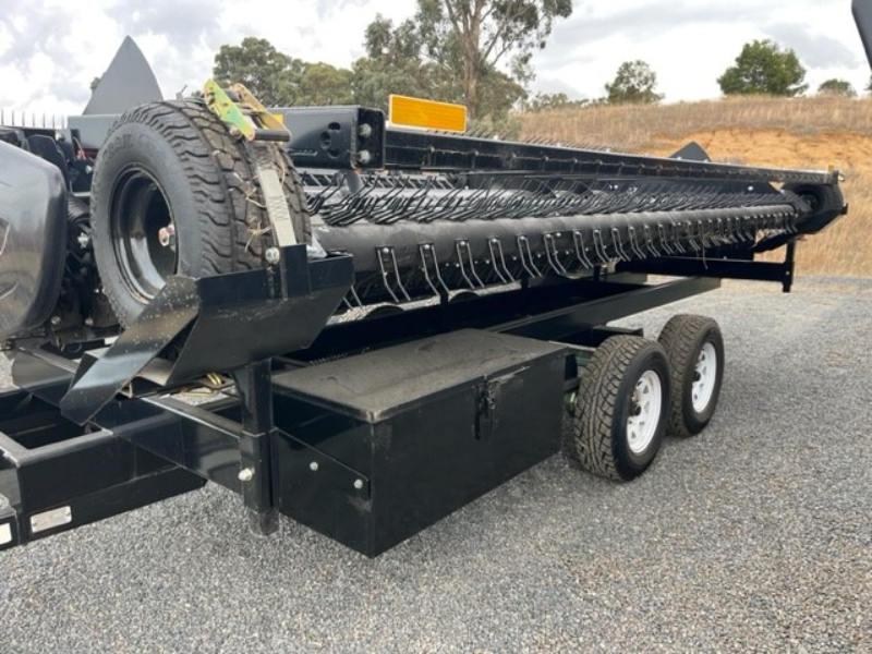 Lot 24 - MACDON PW8 CANOLA FRONT AND TRAILER. | AuctionsPlus
