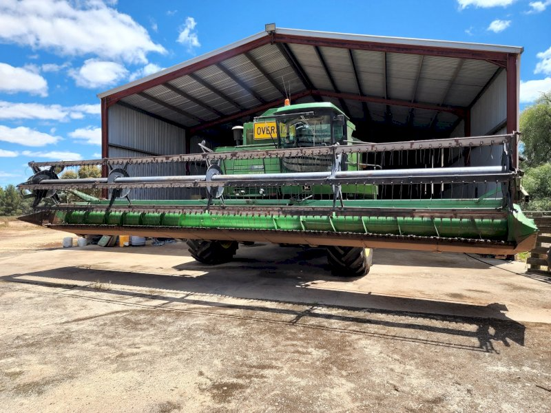 Lot 25 - John Deere 8820 Harvester with 30ft Finger Tyne Front ...