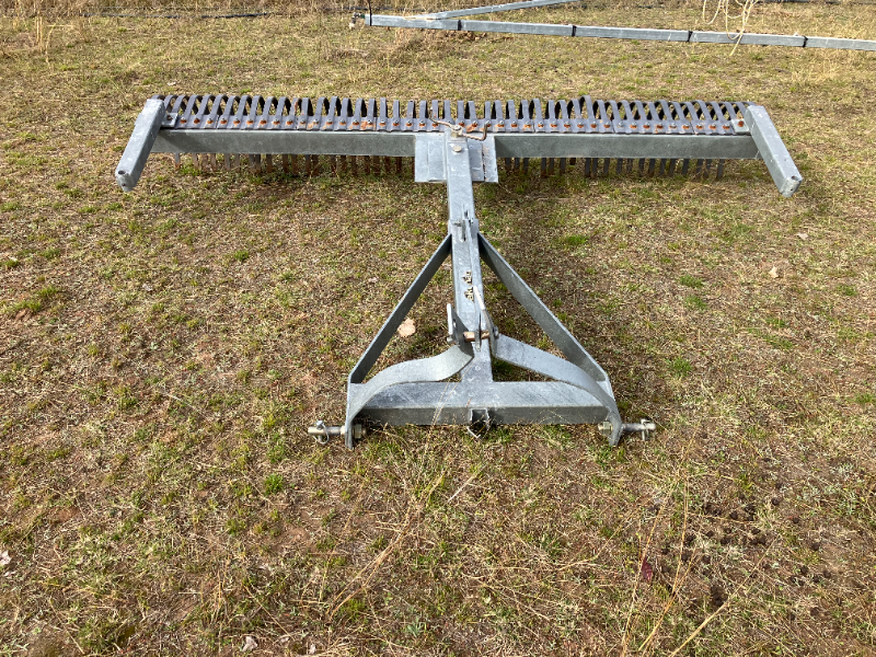 Lot 63 - 3 point linkage stick rake. Has bend in head. | AuctionsPlus