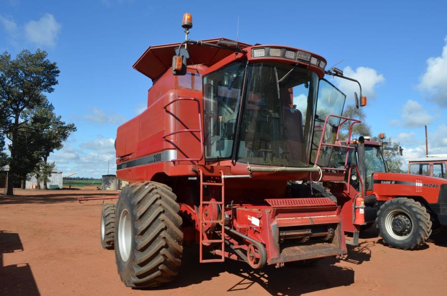 Lot 6 - Case 2188 Combine with 30ft 1010 Front & Trailer | AuctionsPlus