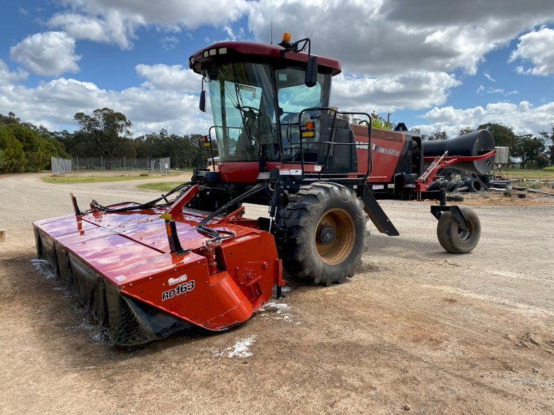 Lot 1 - 2011 Case IH 2303 Windrower | AuctionsPlus