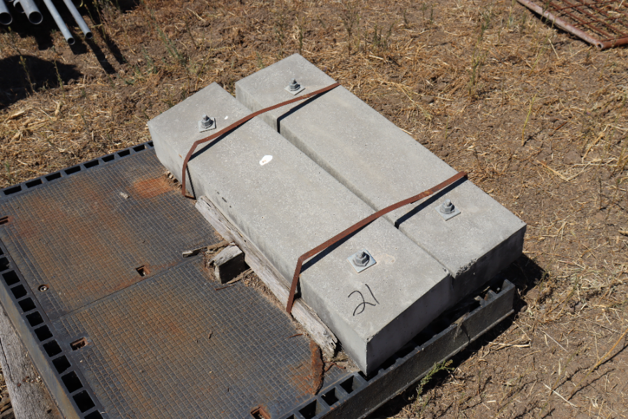 Lot 21 - Two concrete blocks 270mm x 150m x 1m | AuctionsPlus