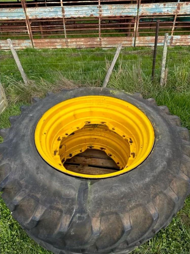 Lot 117 - 14.9 R30 John Deere Front Tyre & Rim | AuctionsPlus
