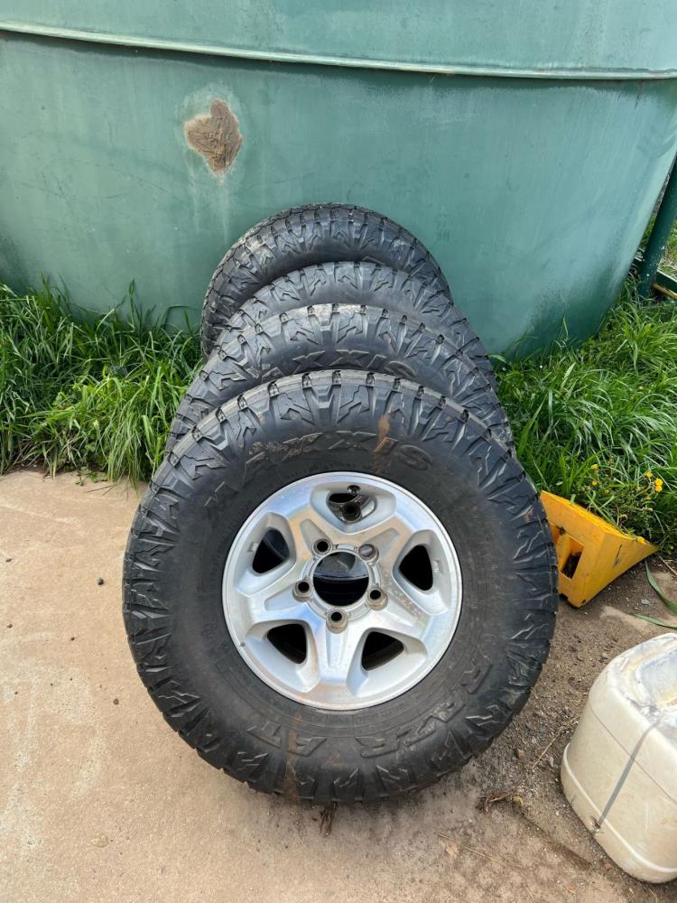 Lot 120 - 79 Series Landcruiser Rims & Tyres 285/75R16 | AuctionsPlus