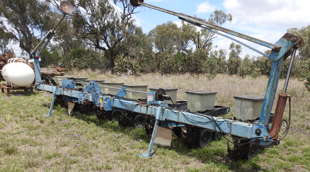 Lot 32 - Kinze TPL 8 row row crop planter; planter boxes, used planter ...
