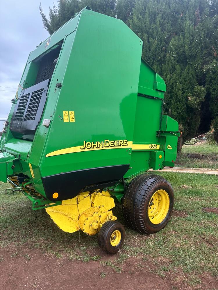 Lot 10 - John Deere 592 Round Baler w/ Hi Flow Pickup | AuctionsPlus