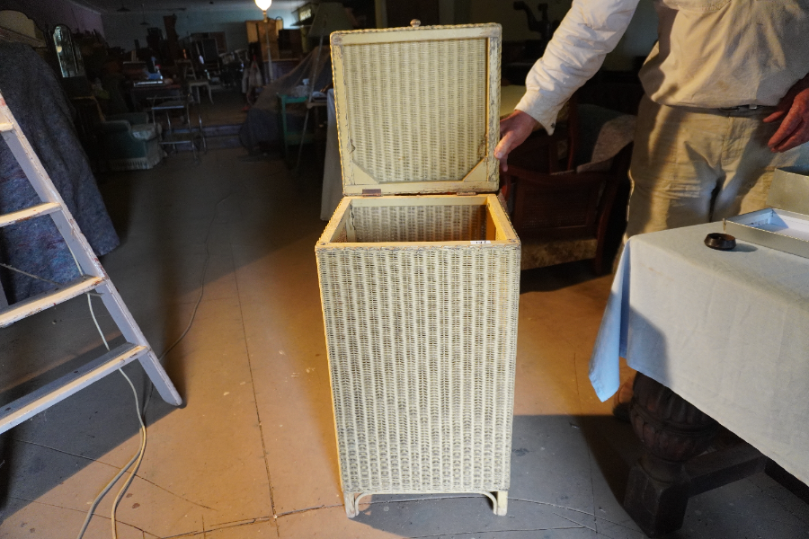 Lot 171 - Lloyd Loom cane laundry basket | AuctionsPlus