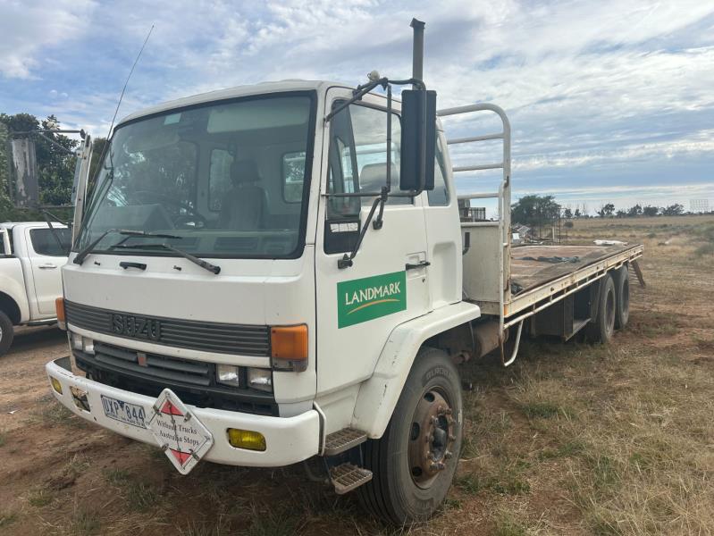 Lot 37 - 1987 Isuzu Bogie Axle Tray Truck | AuctionsPlus