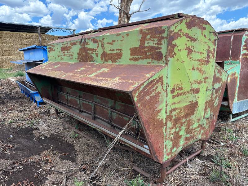 Lot 101 - 4m* Cattle feeders | AuctionsPlus