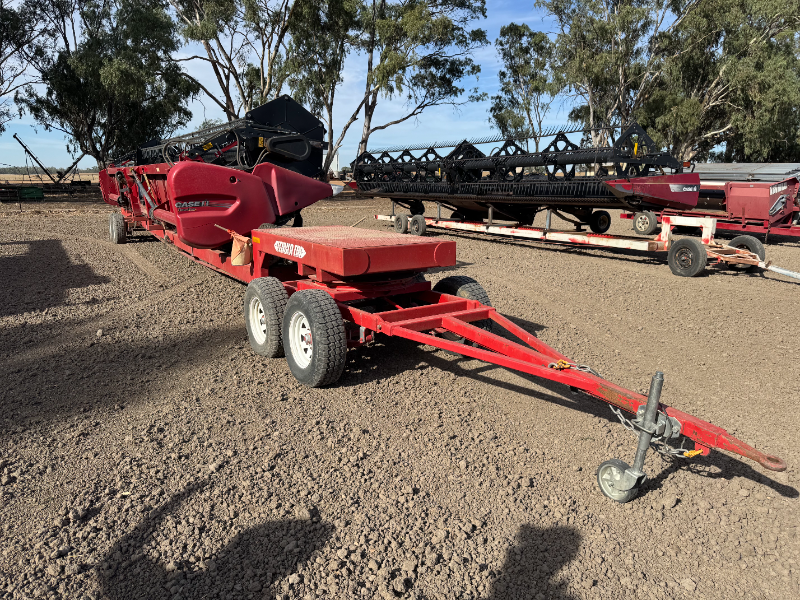 Lot 23 - 35' Case TerraFlex Header Front on Comb Trailer | AuctionsPlus