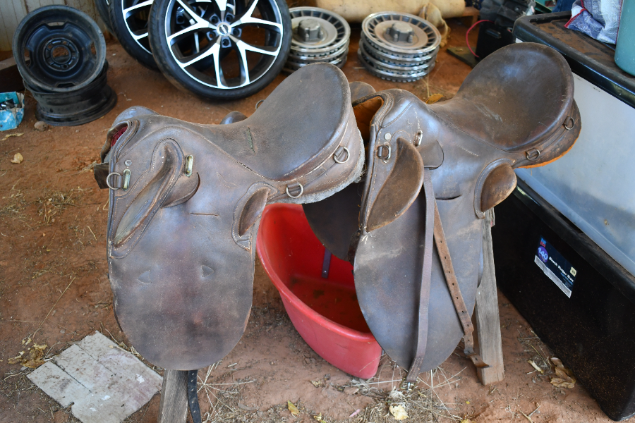Lot 53 - 2x older stock saddles | AuctionsPlus