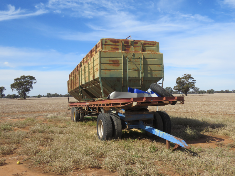 LOT 15 - GRAIN BINS ON TRAILER - 14 FT & 12 FT BELLY DROP BINS C/W FARM ...