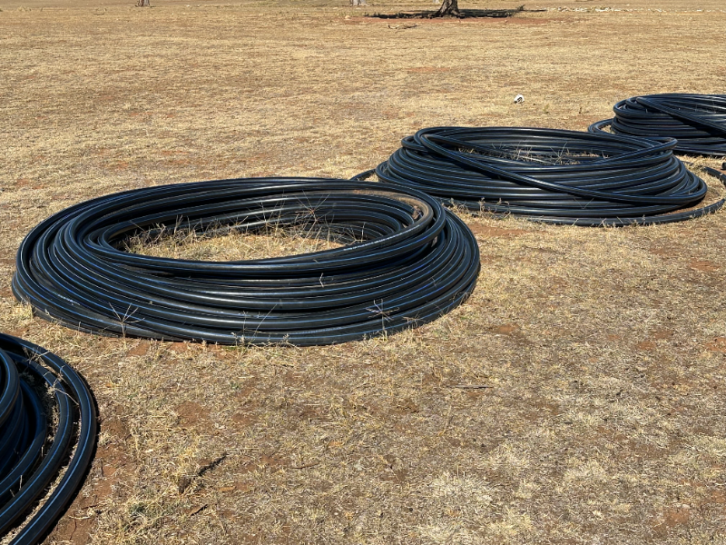 Lot 118 - 2x rolls Iplex 50mm poly pipe | AuctionsPlus