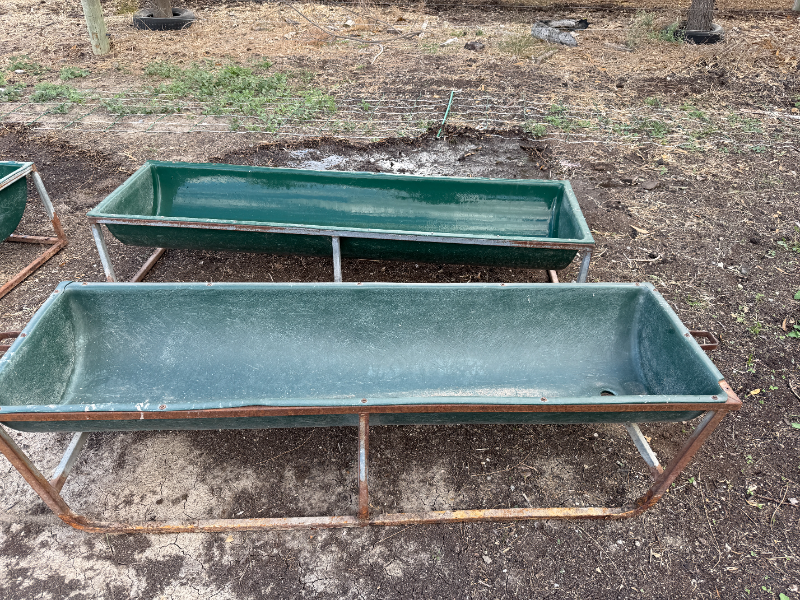 Lot 73 - 2 x 1800mm Polymaster Grain Troughs | AuctionsPlus
