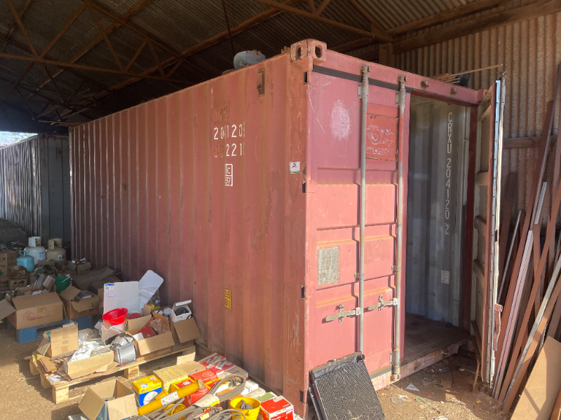 Lot 25 - Red Shipping Container 20' x 8', lockable. | AuctionsPlus