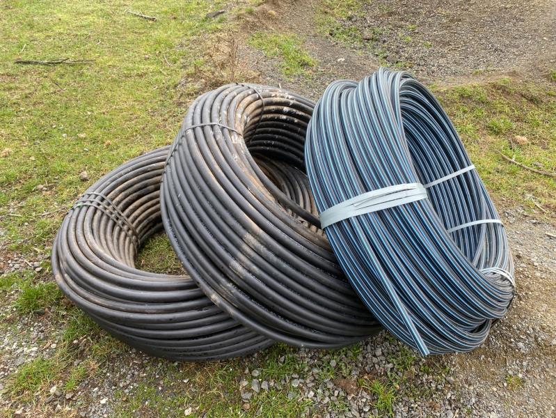 Lot 47 - 3 Coils Poly Pipe - 2x Unused 1'' & 1x part roll 1/2 ...