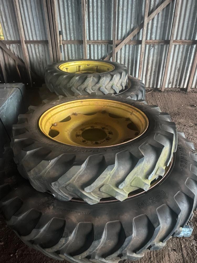 Lot 87 - Set John Deere Row Crop Wheels - 12.4R32 & 13.6R48 | AuctionsPlus