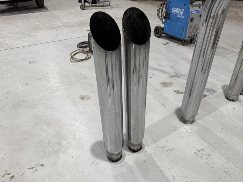 Lot 84 - Pair of Stainless Truck Exhaust Stacks | AuctionsPlus