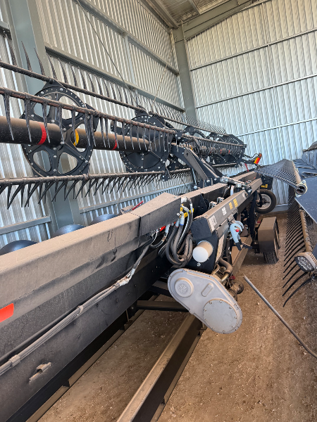 Lot 8 - D140 Macdon header front & trailer | AuctionsPlus