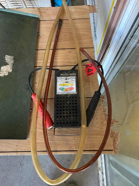 Lot 241 - Battery load tester and Syphon Hoses | AuctionsPlus