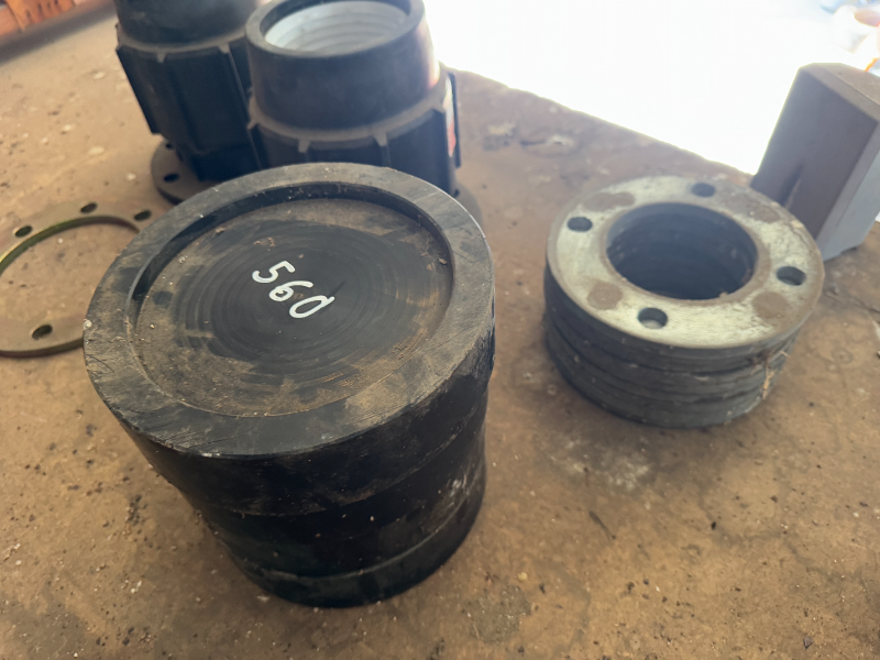 LOT 560 - Assorted Flanges & Poly End Caps | AuctionsPlus