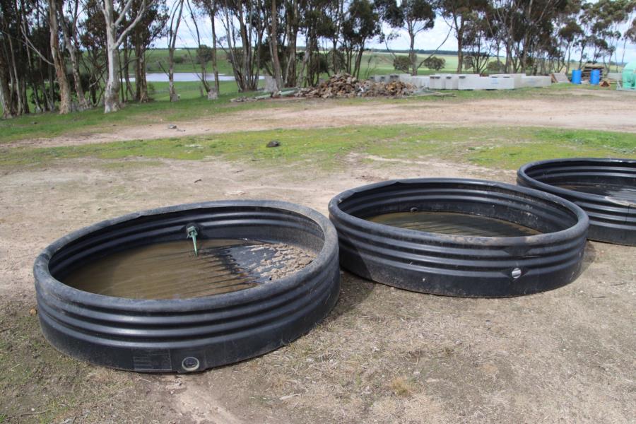 Lot 510 - 2 Round Poly Troughs | AuctionsPlus