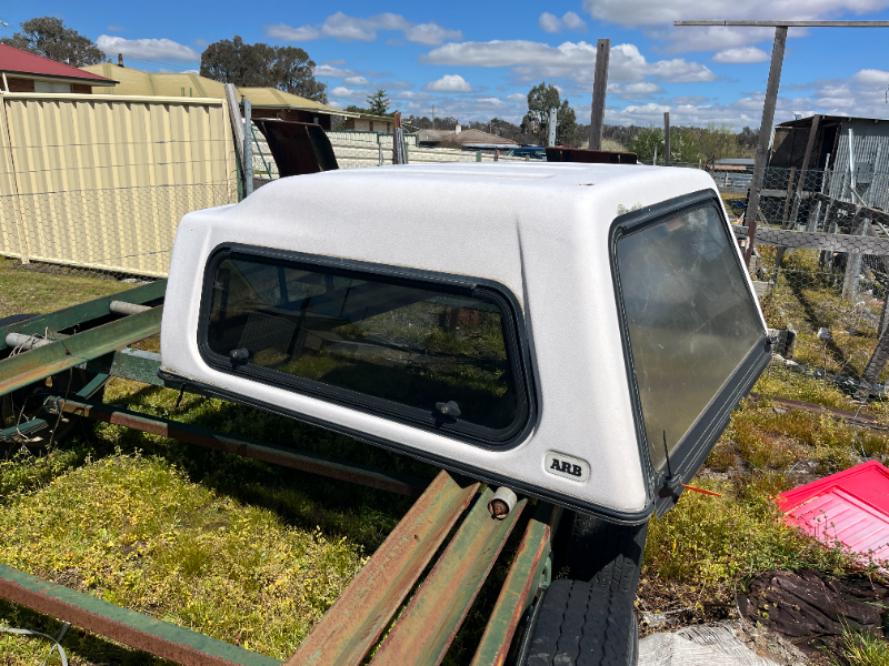 Lot 51 - 92 Holden Rodeo dual cab ARB canopy | AuctionsPlus