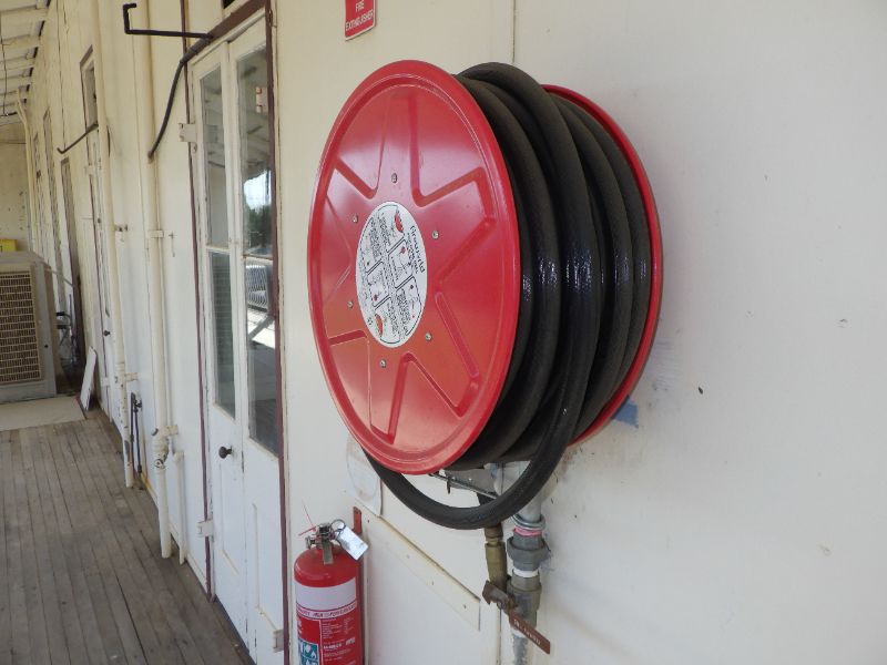 Lot 88 - FIRE HOSE REELS X 2 + FIRE EXTINGUISHER | AuctionsPlus