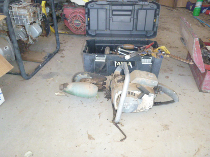 Lot 33 - Homelite chainsaw with Atom post borer | AuctionsPlus