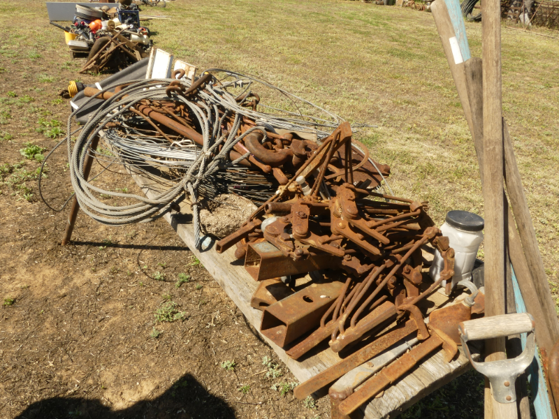 Lot 135 - Pallet Donaldson strainers, shovels, pick heads, chain tongs ...