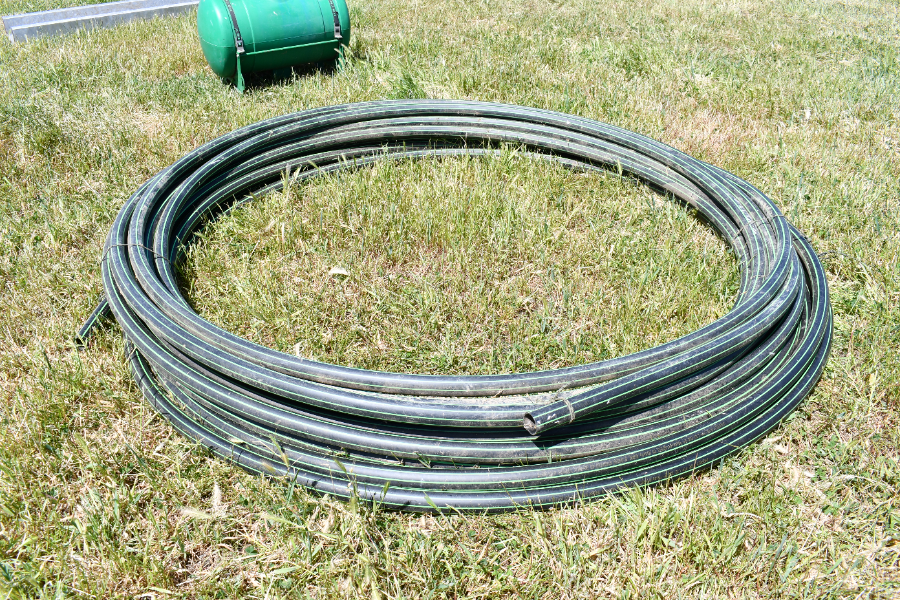 Lot 83 - Roll of 2 inch poly pipe | AuctionsPlus