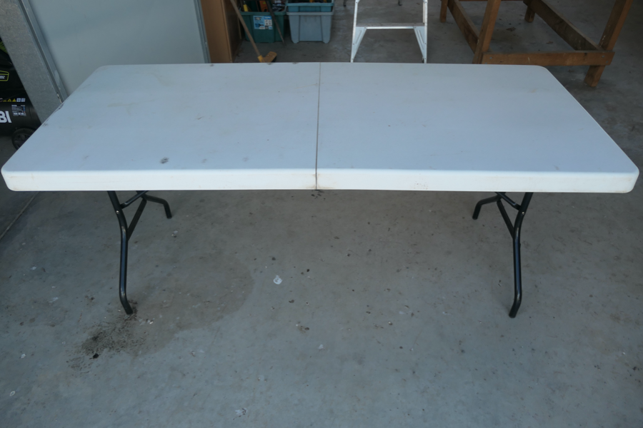 Lot 26 - Folding camp table | AuctionsPlus