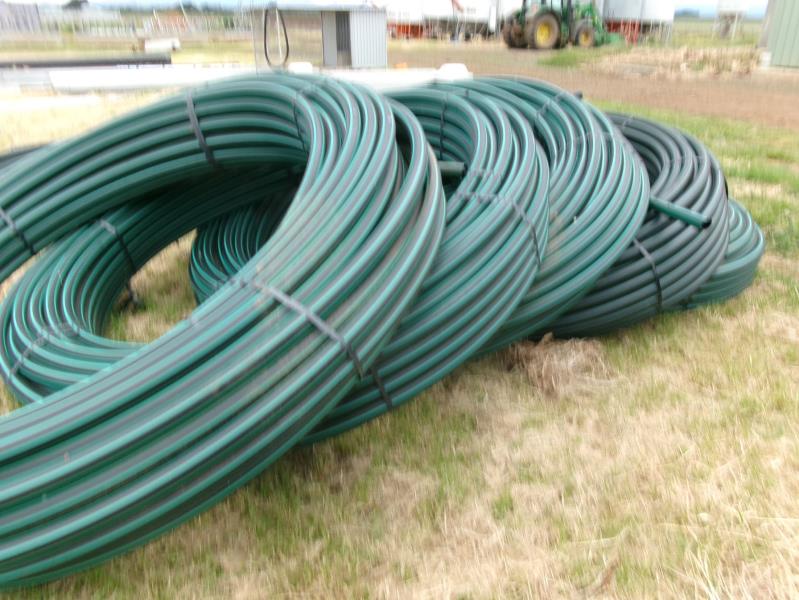 Lot 82 - 2'' Green Line Poly Pipe - 1x Full Roll | AuctionsPlus