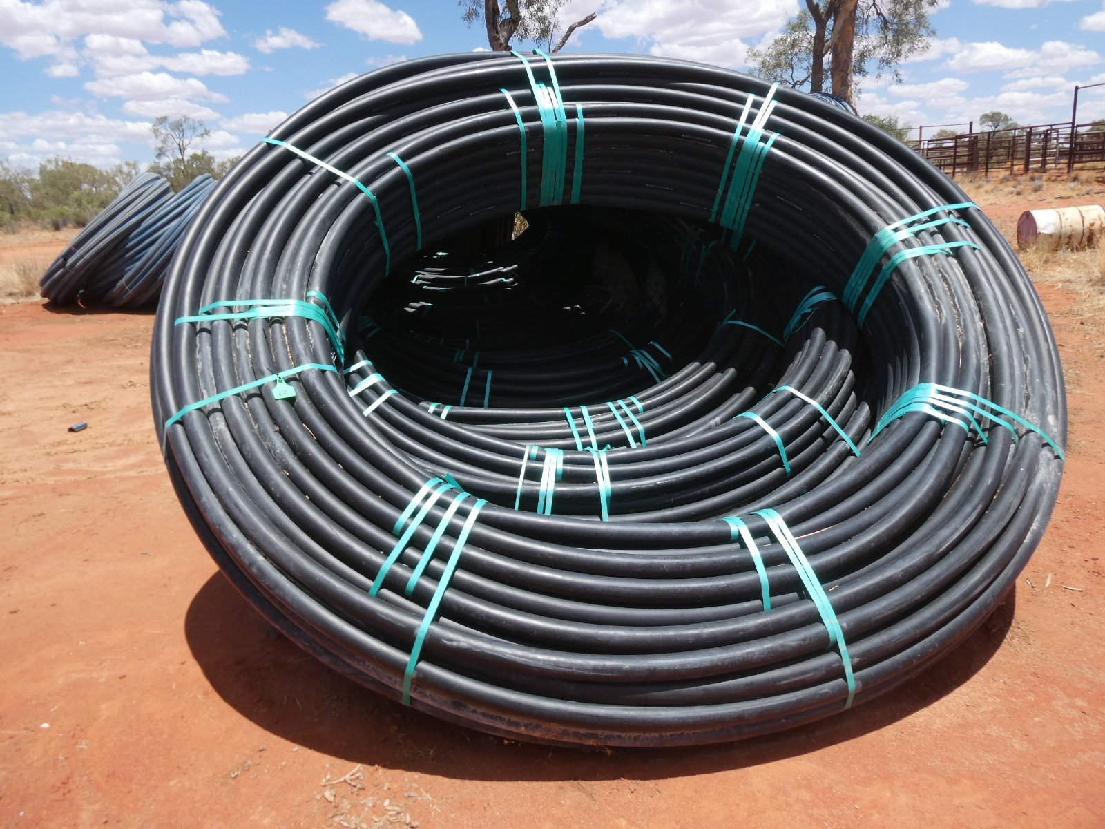 Lot 12 - 14 X 500M COILS 63MM POLY | AuctionsPlus